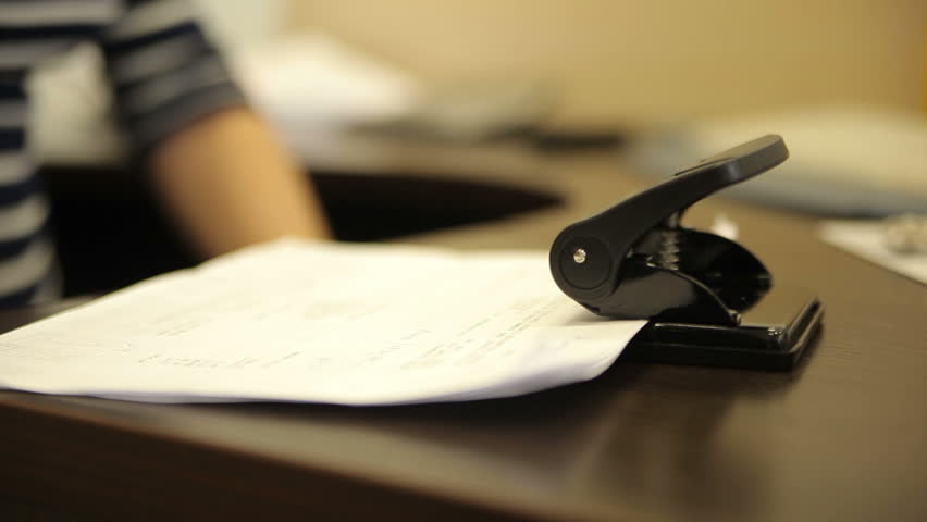 Hole Punch For Binding Documents Stock Footage Video 5201909 - Shutterstock