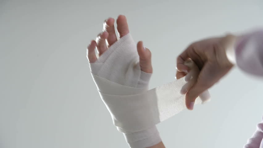 Woman Wrapping Her Hand With Bandage; HD Photo JPEG Stock Footage Video ...