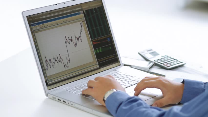 Businessman Checking Stock Market At His Laptop Computer Stock Footage ...