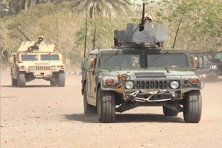 US Army Armored Humvees Head Down A Road In Iraq. Stock Footage Video ...