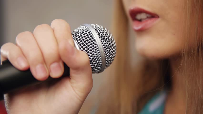 Close-up Of Singer Touching Microphone Singing Stock Footage Video ...