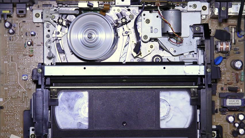 Rewind Of Magnetic Videotape In The VCR Mechanism.The Sequence Of Video ...
