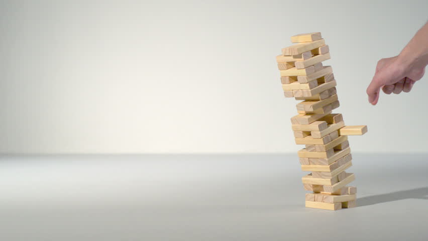 Tower Of Building Blocks Falling Over In Slow Motion Stock Footage ...