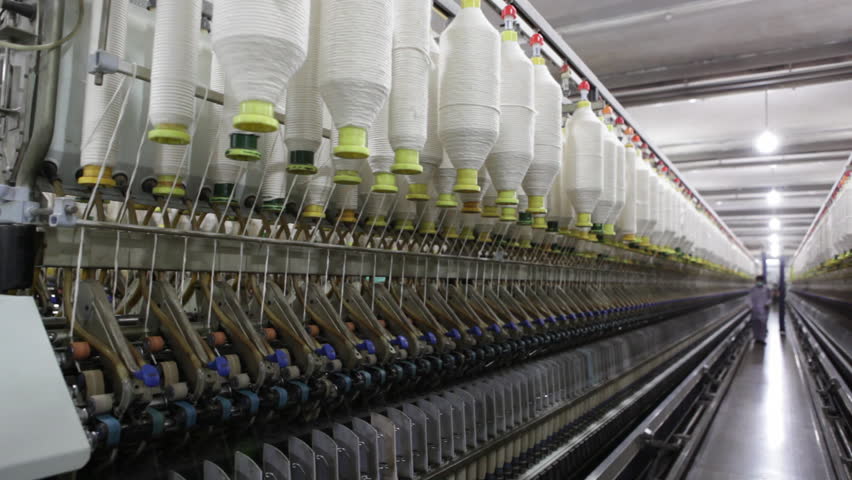KARACHI, PAKISTAN - JULY 27, 2013: Inspector Reviews Newly Manufactured ...