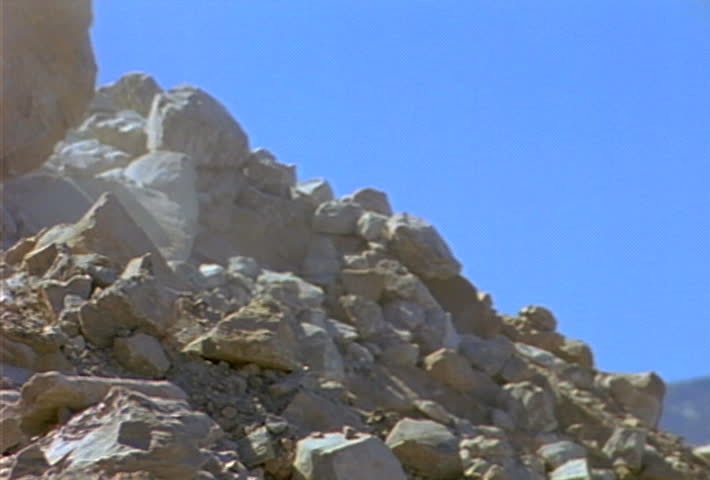 Boulders And Smaller Rocks Roll And Slide Down A Hill During A ...