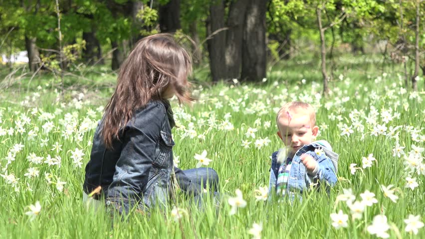Mother And Baby In The Flowers. They Laugh. Stock Footage Video 1263268 ...