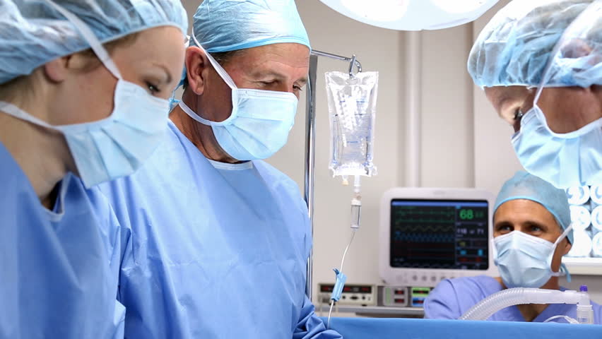 Surgical Team In Operating Room. Stock Footage Video 7417180 - Shutterstock