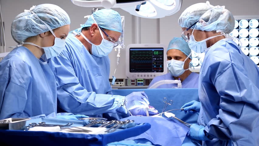 Surgical Team In Operating Room. Stock Footage Video 7417174 - Shutterstock