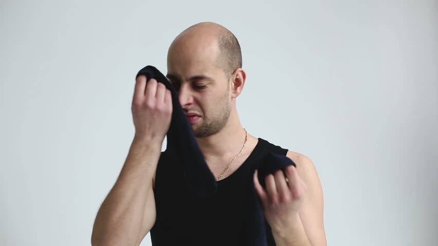 Smelling Socks Stock Footage Video - Shutterstock