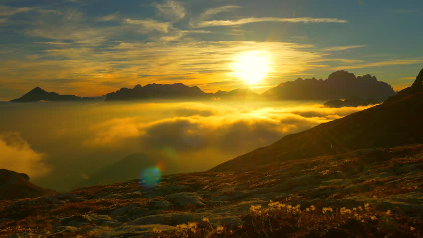 AERIAL: Sunny Mountaintop Above The Sunset Clouds Stock Footage Video ...