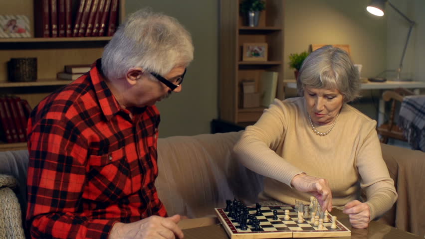 Impatient Boy Strewing Chess Pieces Around Unwilling To Continue Game ...